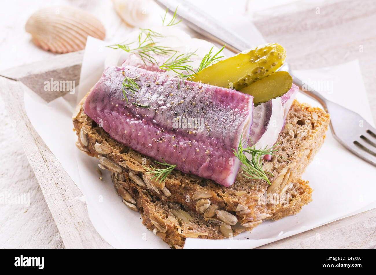 How to eat herring hi-res stock photography and images - Alamy