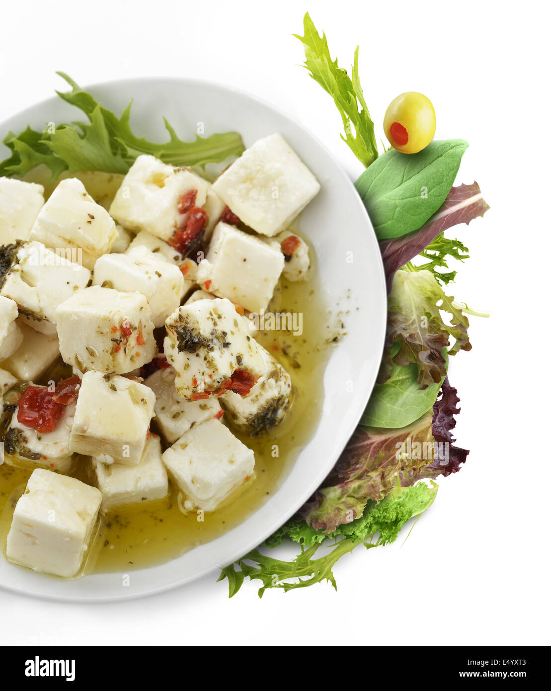 Feta Cheese With Oil And Herbs Stock Photo - Alamy