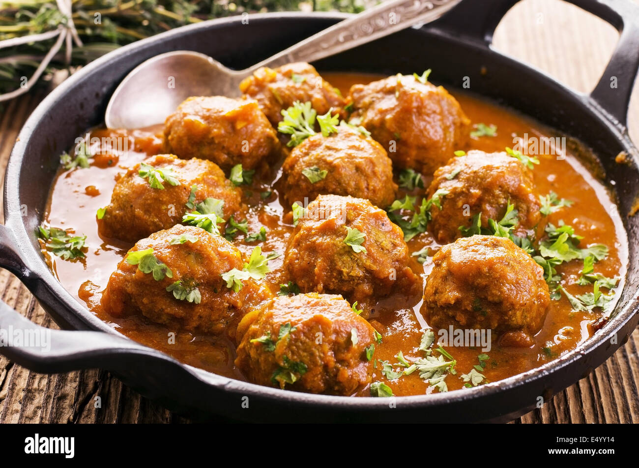 meatballs in the sauce Stock Photo - Alamy
