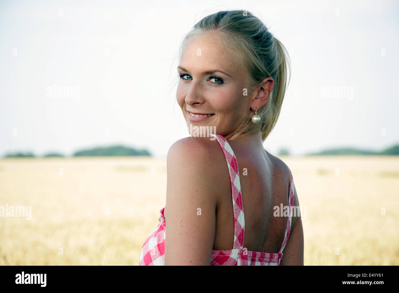 young woman in corn field Stock Photo - Alamy