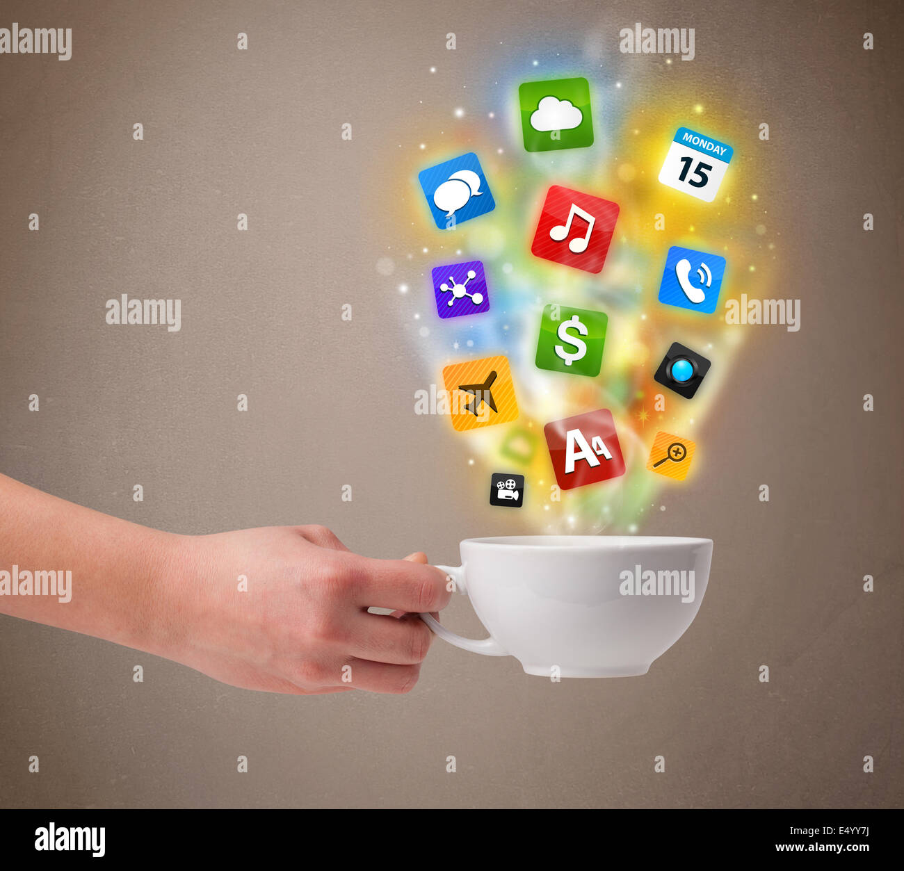 Coffee mug with colorful media icons Stock Photo - Alamy