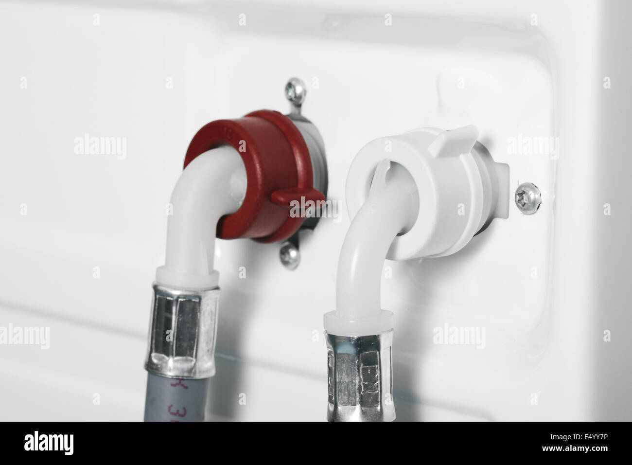 Detail of water attachment to the washing machine Stock Photo - Alamy