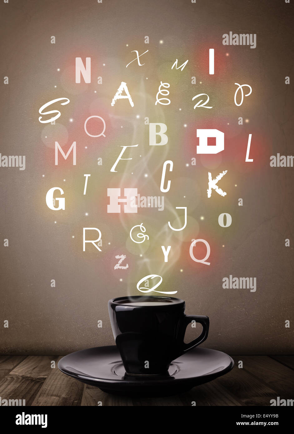 Coffee cup with colorful letters Stock Photo - Alamy