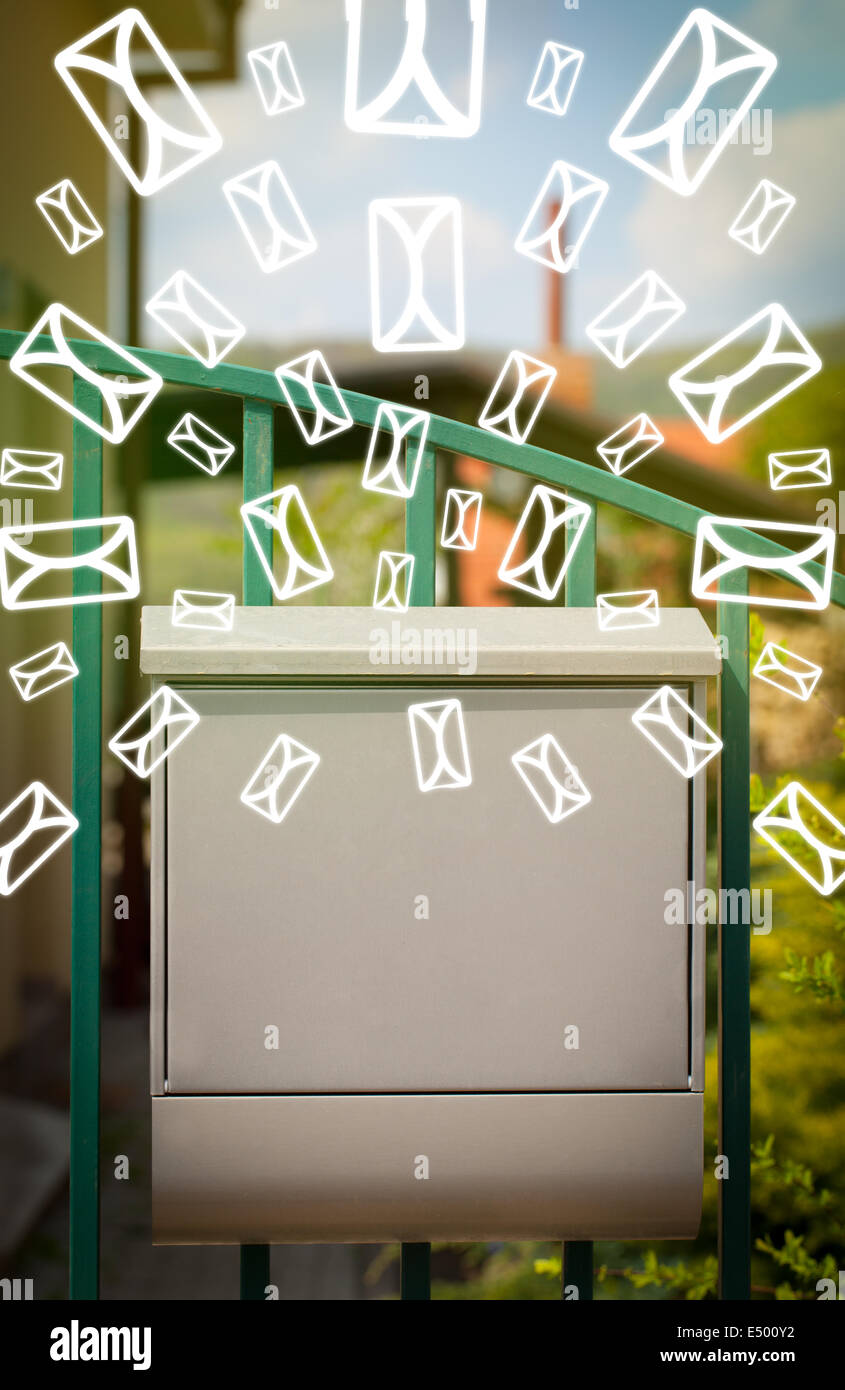 Mailbox with letter icons on glowing green background Stock Photo - Alamy