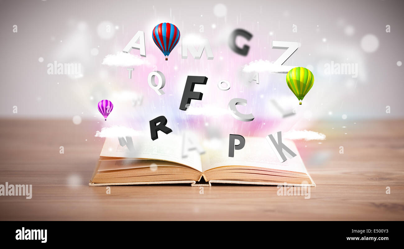 Open book with flying 3d letters on concrete background Stock Photo - Alamy