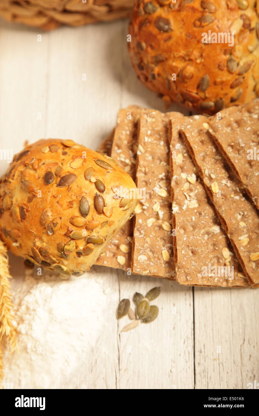 Crusty rolls and crispbread crackers Stock Photo - Alamy