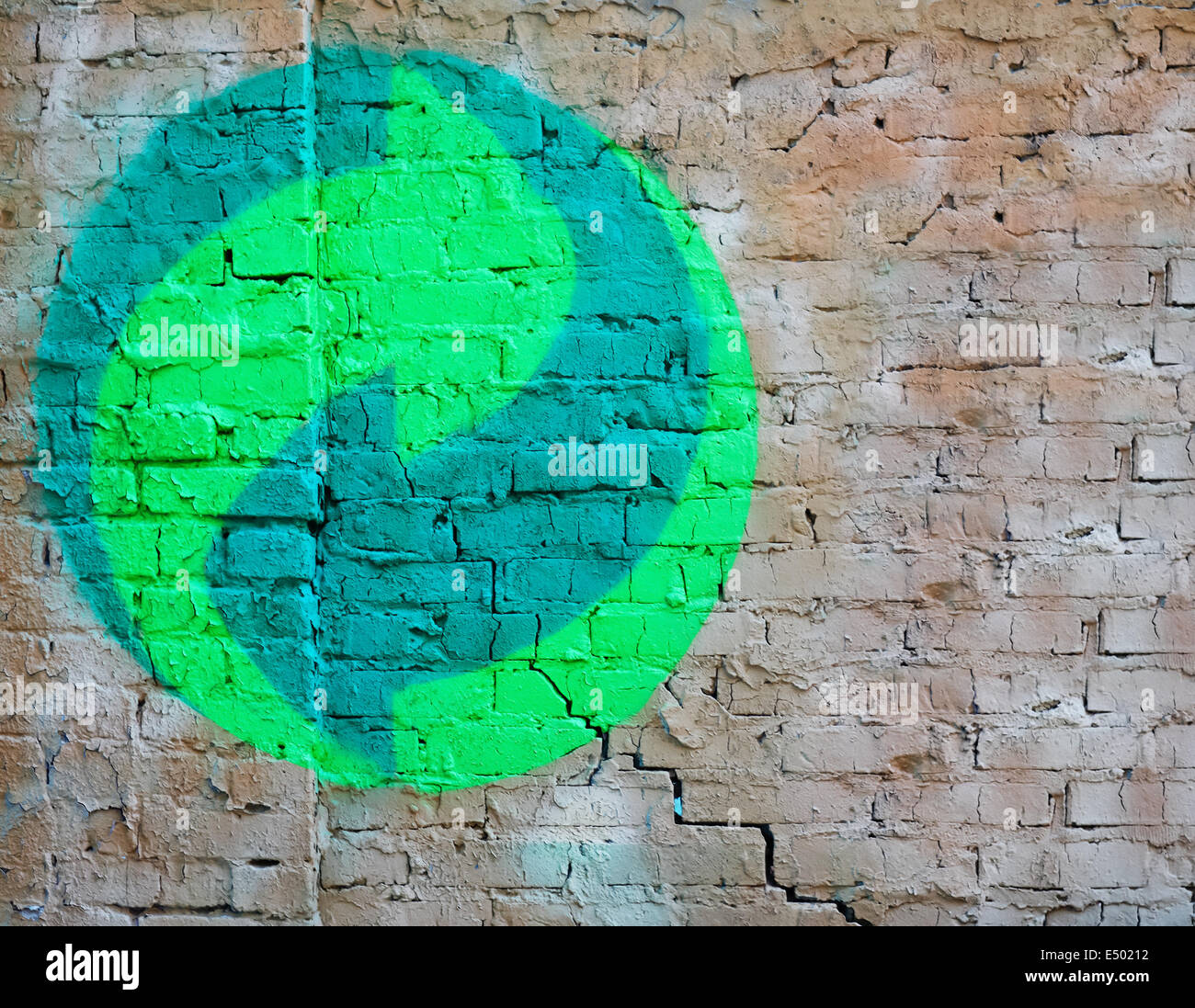Eco sign on the brick wall . Concept Stock Photo - Alamy