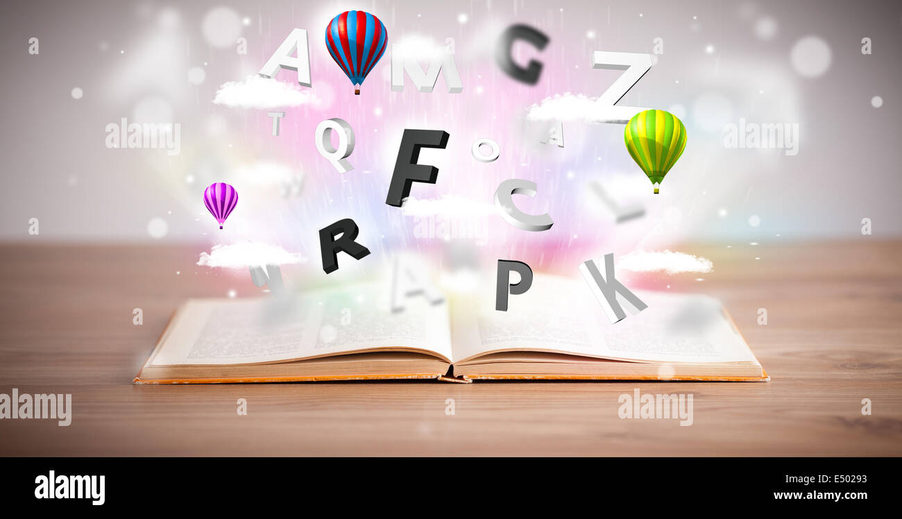 Open book with flying 3d letters on concrete background Stock Photo - Alamy