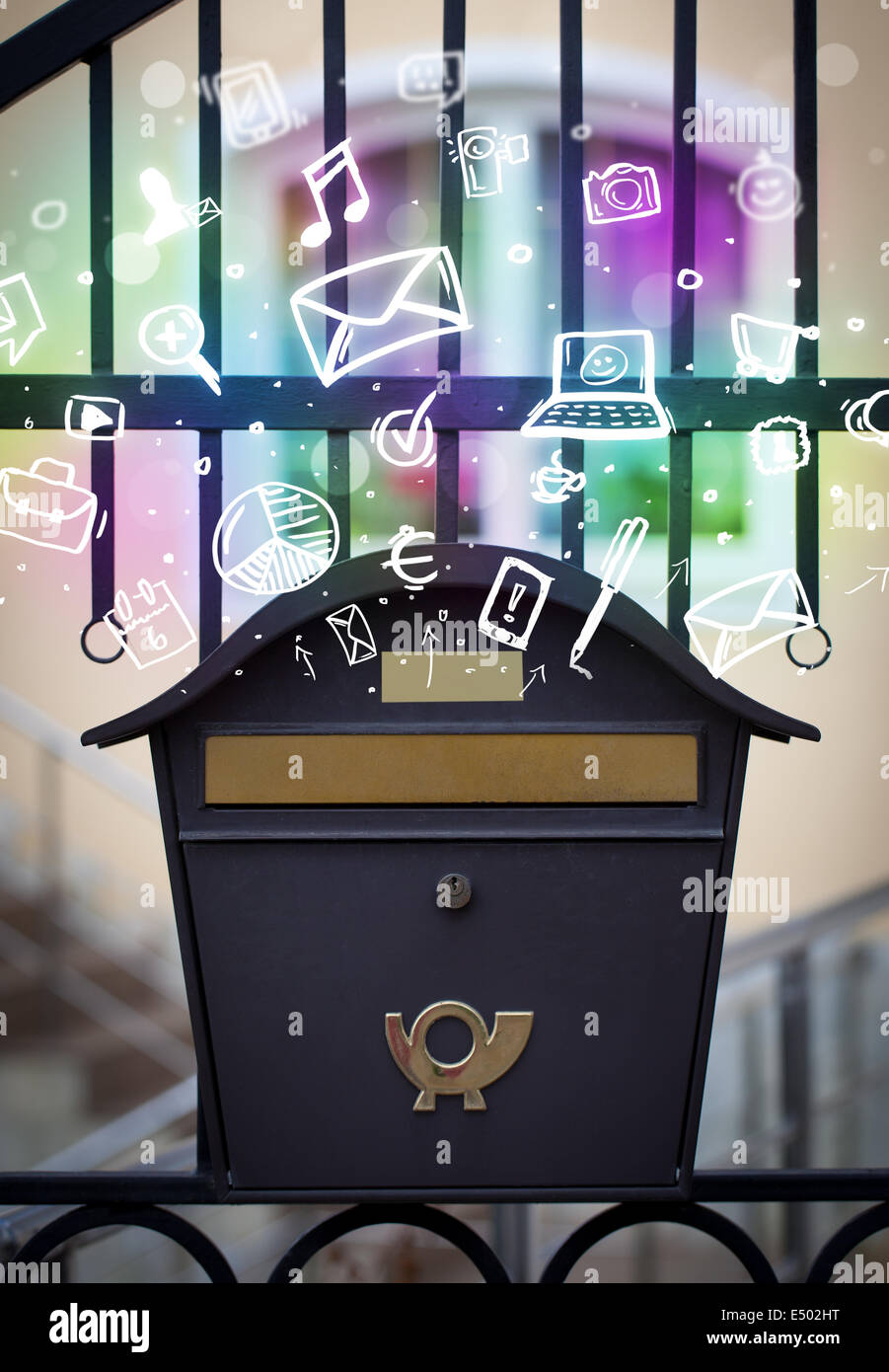 Colorful icons and symbols bursting out of a mailbox Stock Photo - Alamy