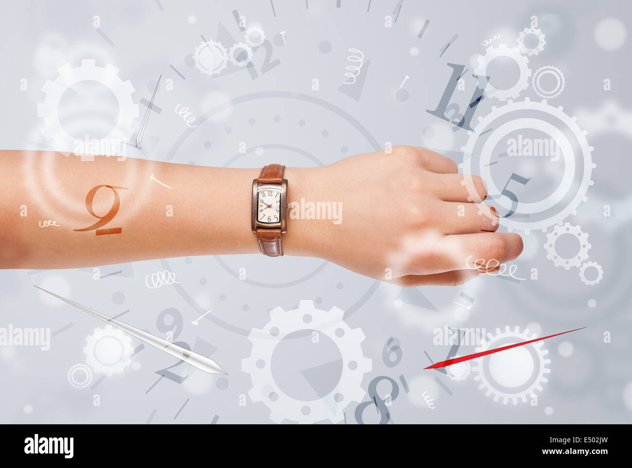 Hand with watch and numbers on the side comming out Stock Photo - Alamy