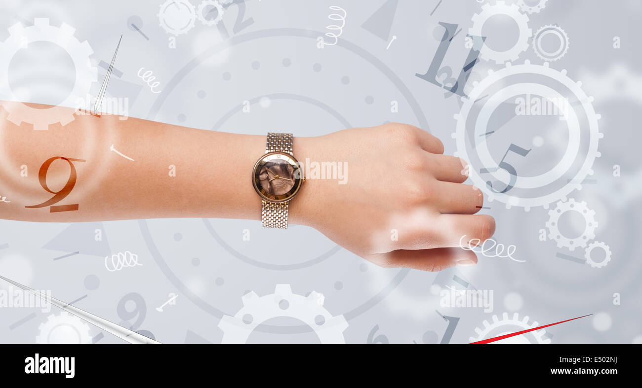 Hand with watch and numbers on the side comming out Stock Photo - Alamy