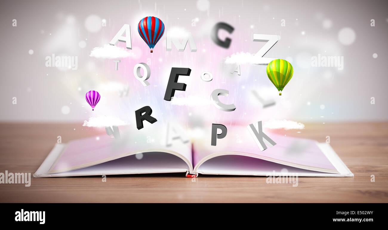 Open book with flying 3d letters on concrete background Stock Photo - Alamy