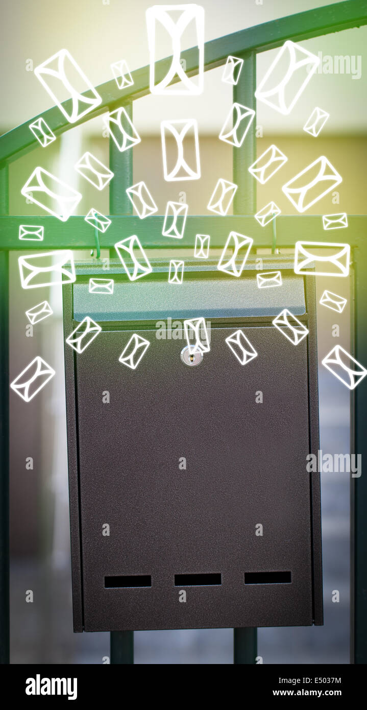 Mailbox with letter icons on glowing green background Stock Photo - Alamy