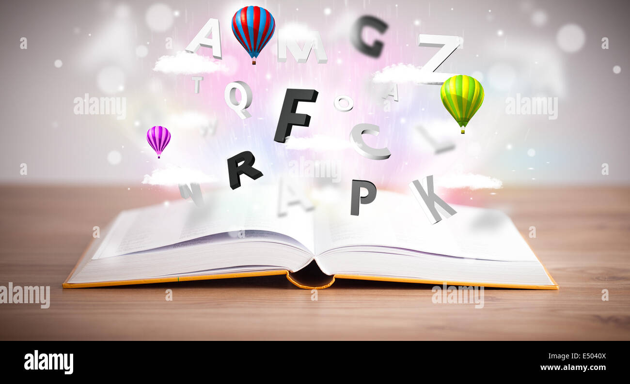 Open book with flying 3d letters on concrete background Stock Photo - Alamy