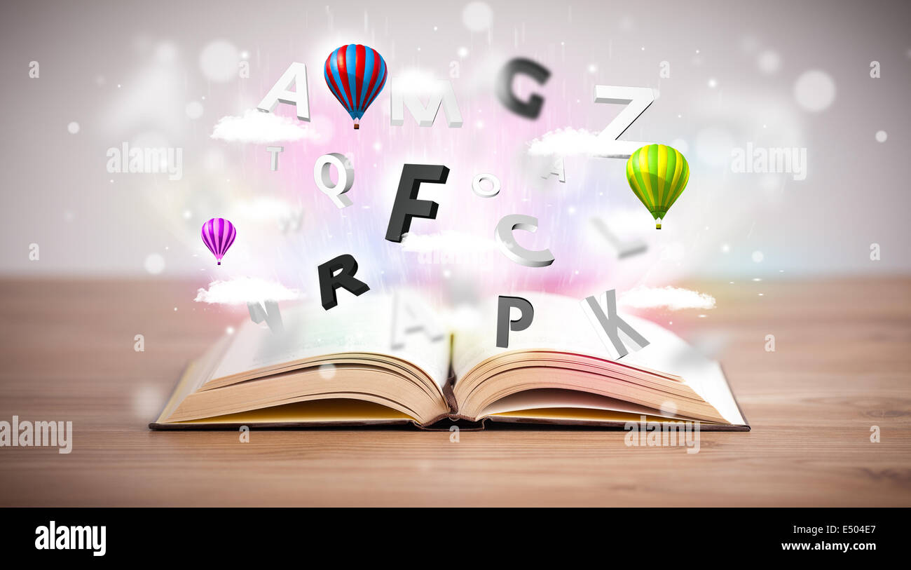 Open book with flying 3d letters on concrete background Stock Photo - Alamy