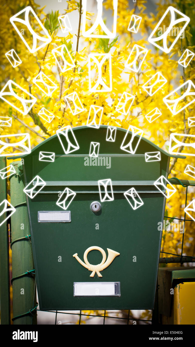 Mailbox with letter icons on glowing green background Stock Photo - Alamy