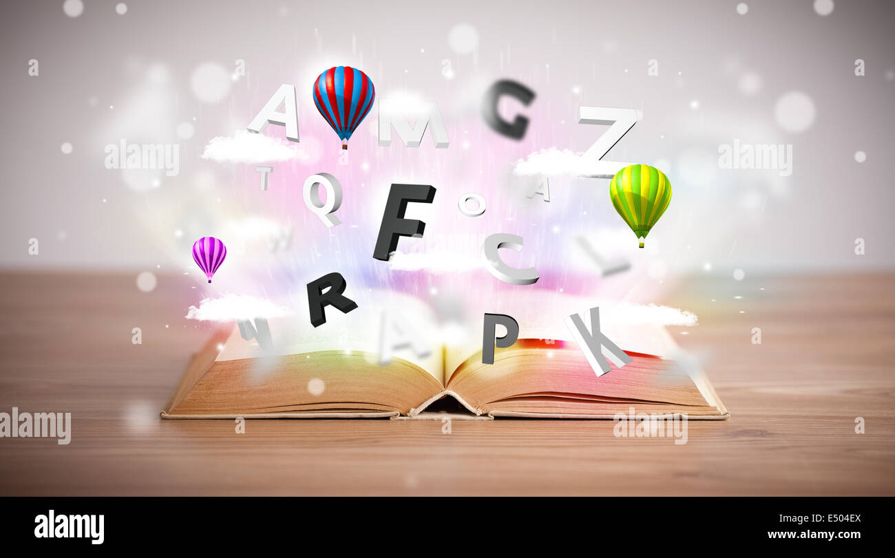 Open book with flying 3d letters on concrete background Stock Photo - Alamy