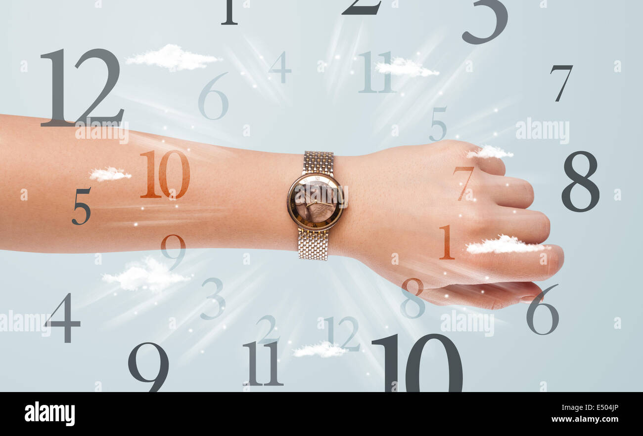 Hand with watch and numbers on the side comming out Stock Photo - Alamy
