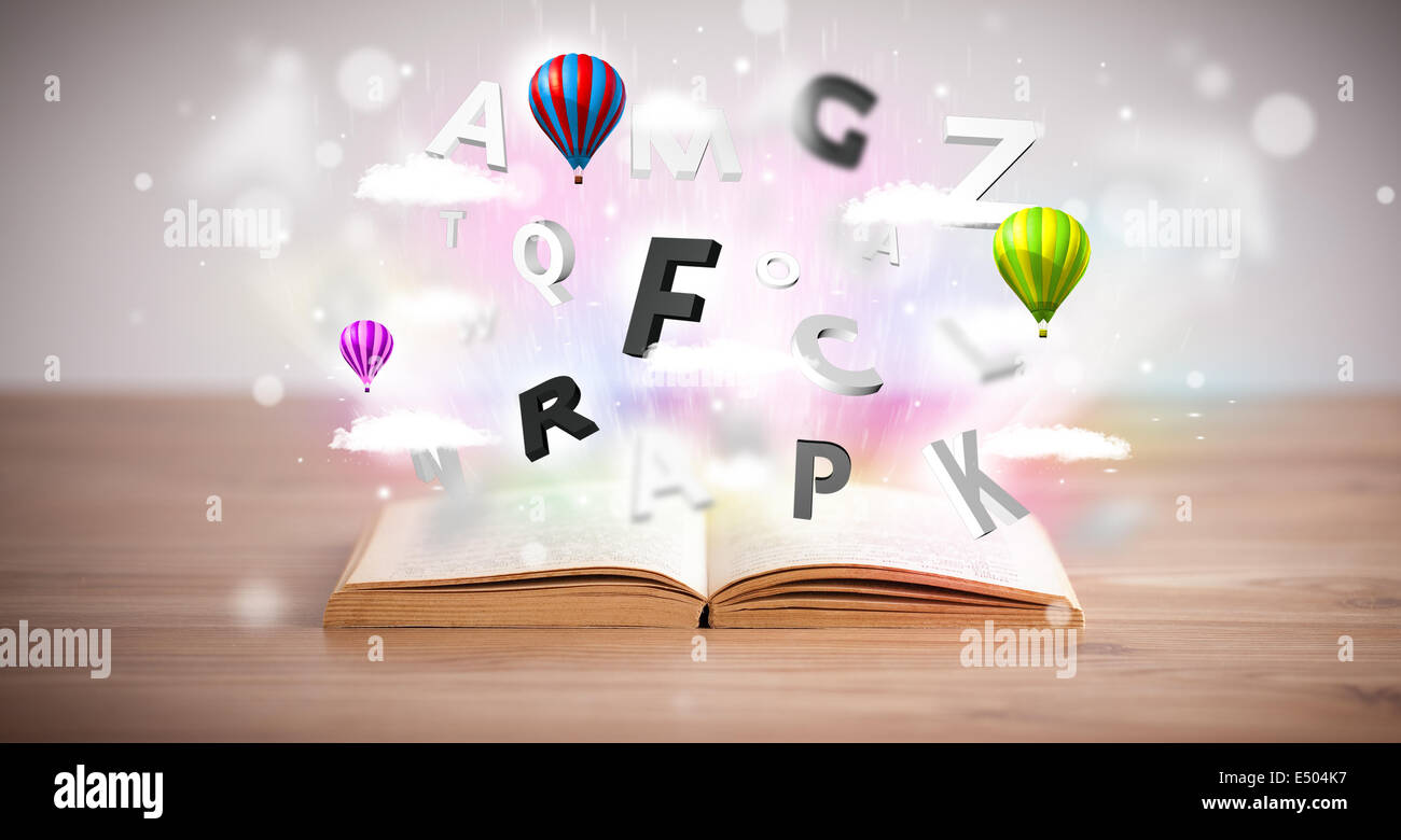 Open book with flying 3d letters on concrete background Stock Photo - Alamy