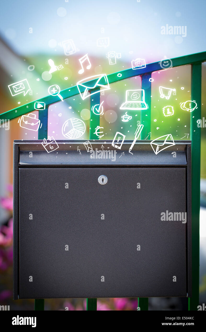 Colorful icons and symbols bursting out of a mailbox Stock Photo - Alamy