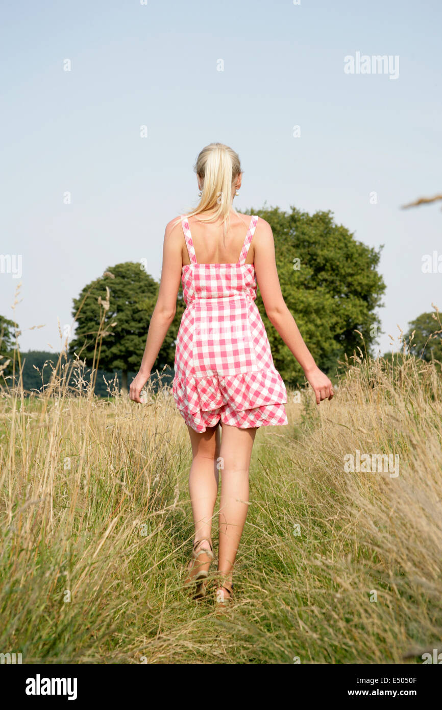 Back view of young woman Stock Photo - Alamy