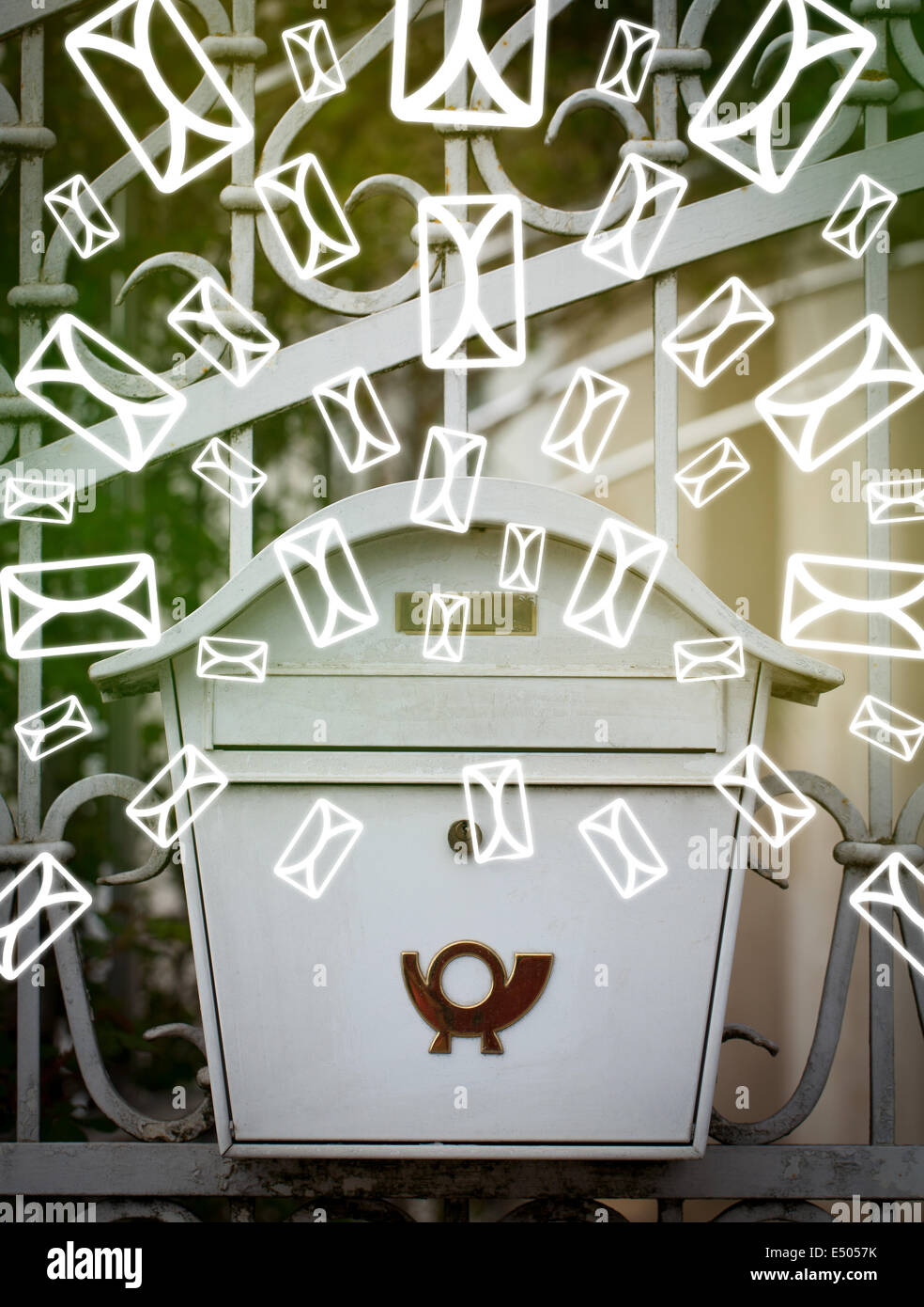 Mailbox with letter icons on glowing green background Stock Photo - Alamy