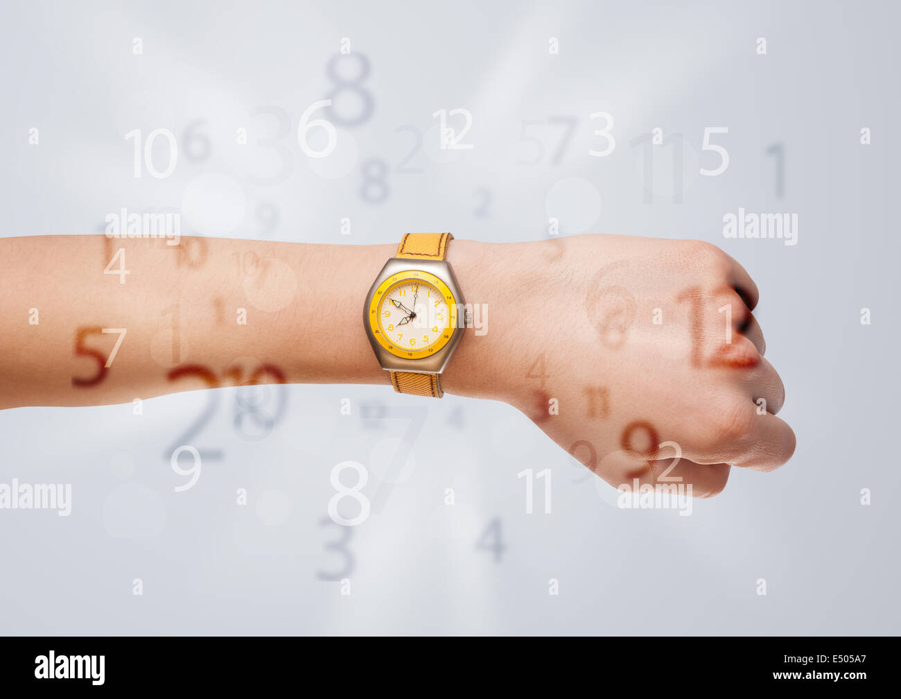 Hand with watch and numbers on the side comming out Stock Photo - Alamy
