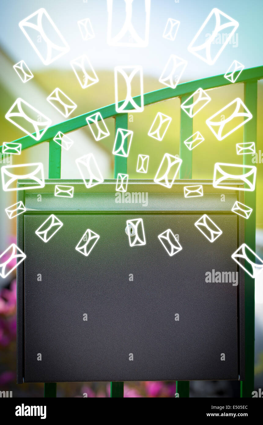 Mailbox with letter icons on glowing green background Stock Photo - Alamy