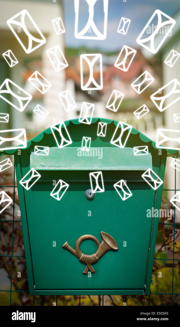 Mailbox with letter icons on glowing green background Stock Photo - Alamy