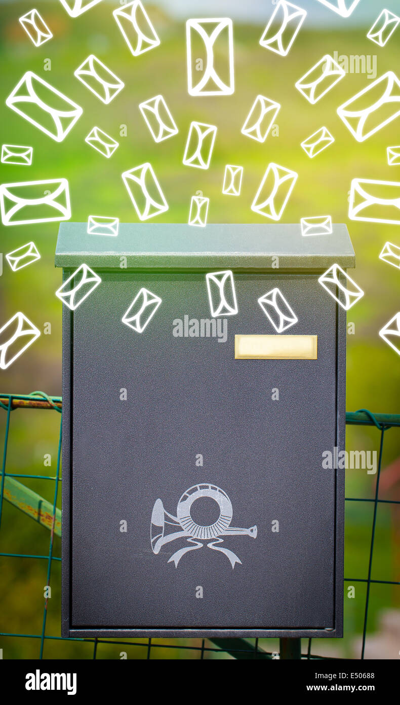 Mailbox with letter icons on glowing green background Stock Photo - Alamy