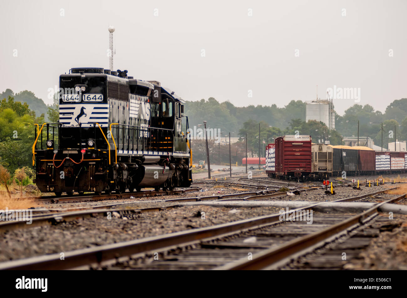 parked black freight train Stock Photo - Alamy
