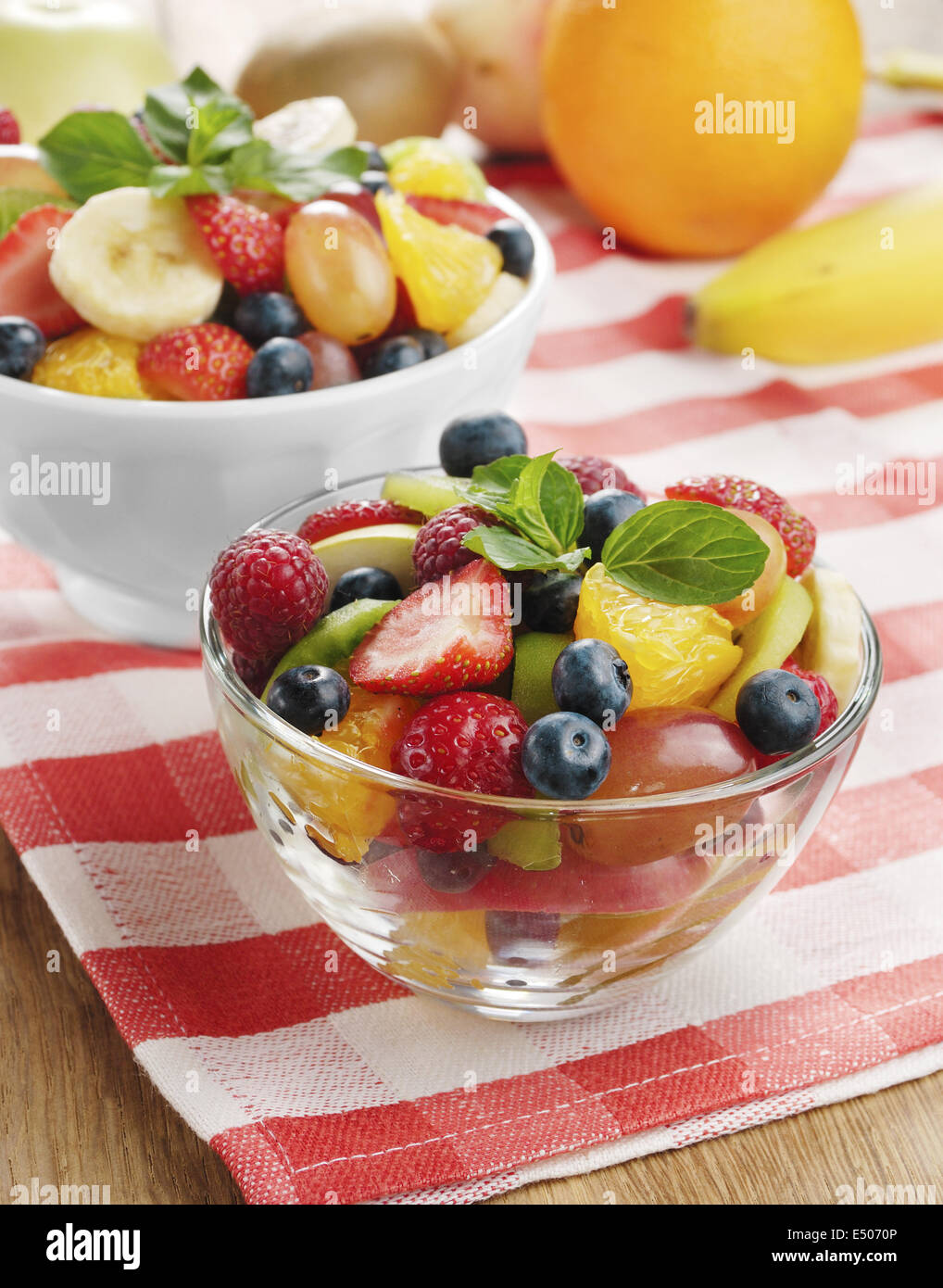 Sweet tasty fruit salad in the bowl Stock Photo - Alamy