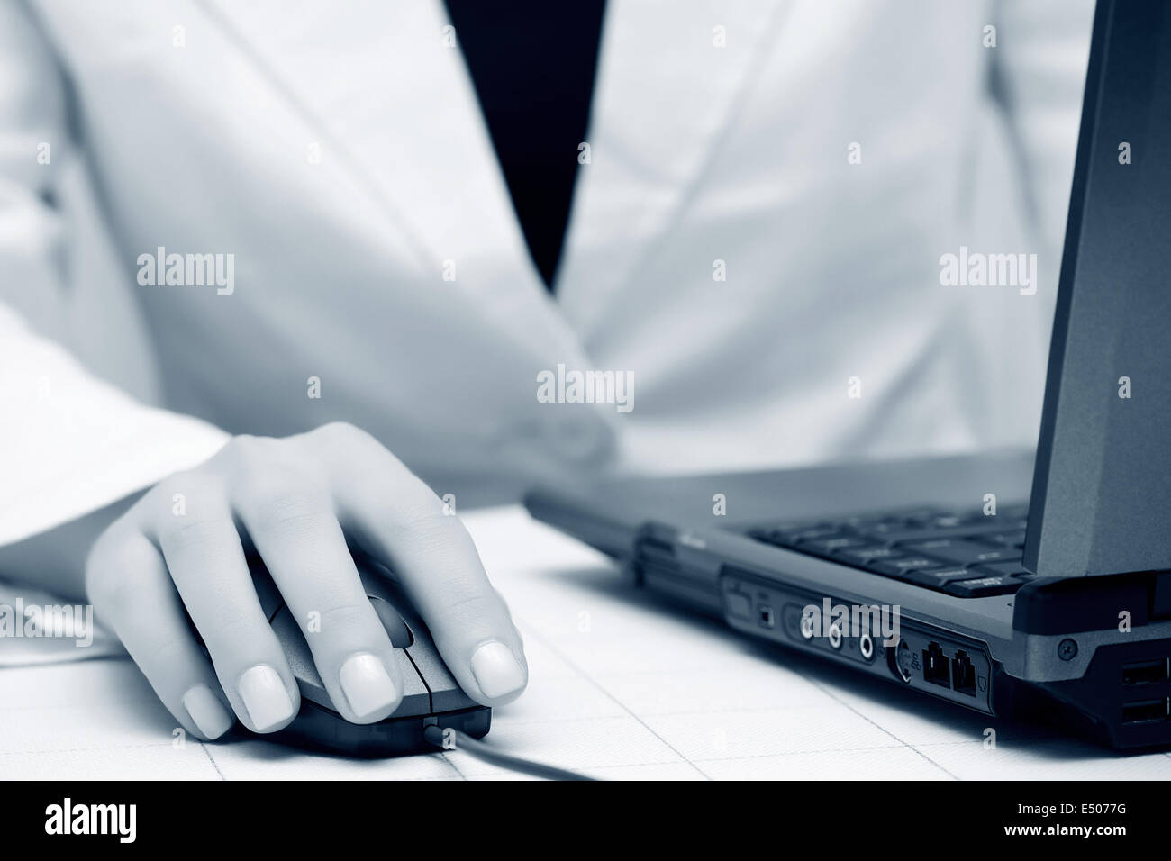 Female hand using laptop Stock Photo - Alamy Female hand using laptop Stock Photo - Alamy