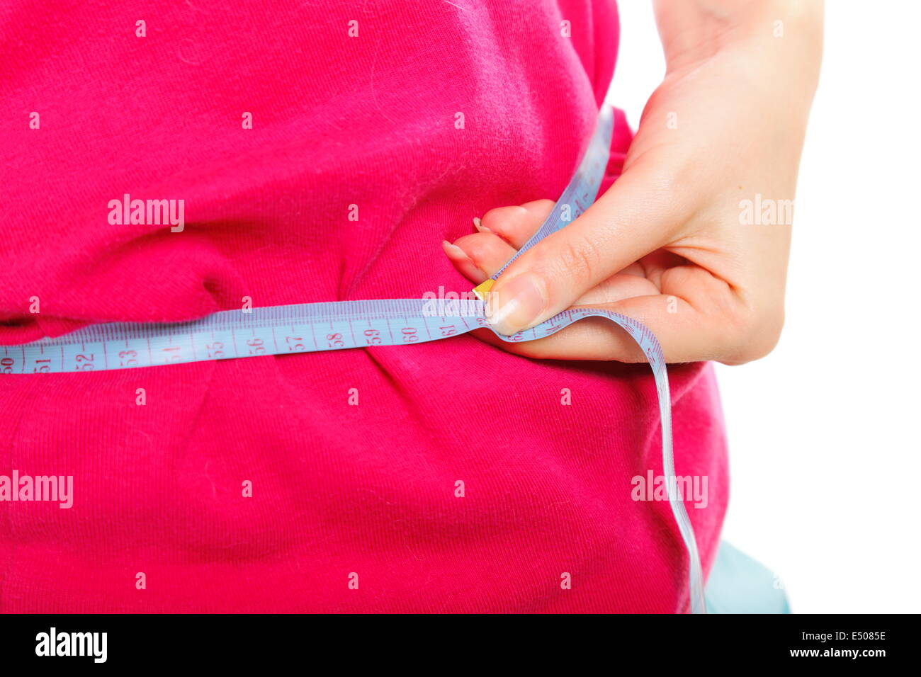 Slim young woman measuring thin hi-res stock photography and images - Alamy