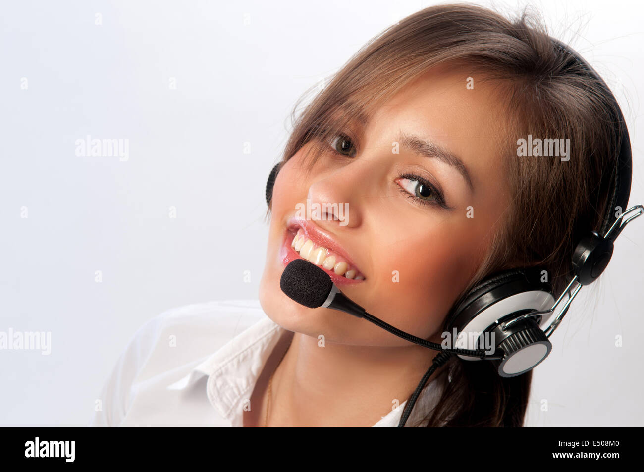 beautiful woman with headset smiling Stock Photo - Alamy