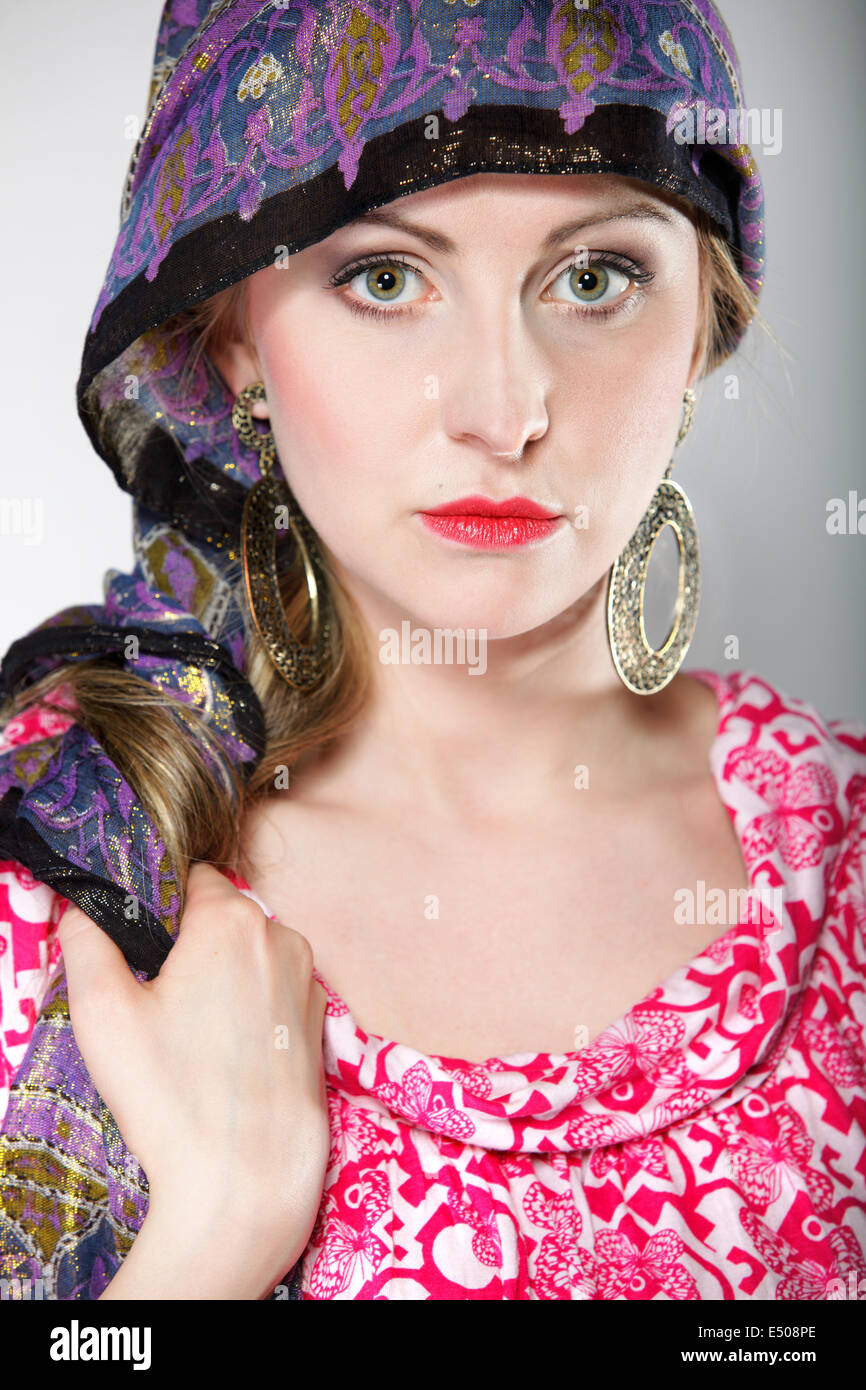 Girl in a head scarf hi-res stock photography and images - Alamy