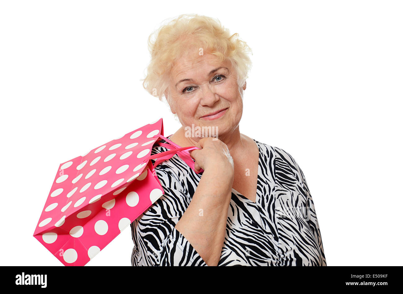 The elderly woman with a package Stock Photo - Alamy