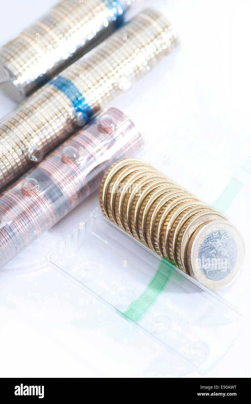 Roll of coins picture over white background. Euros Stock Photo - Alamy