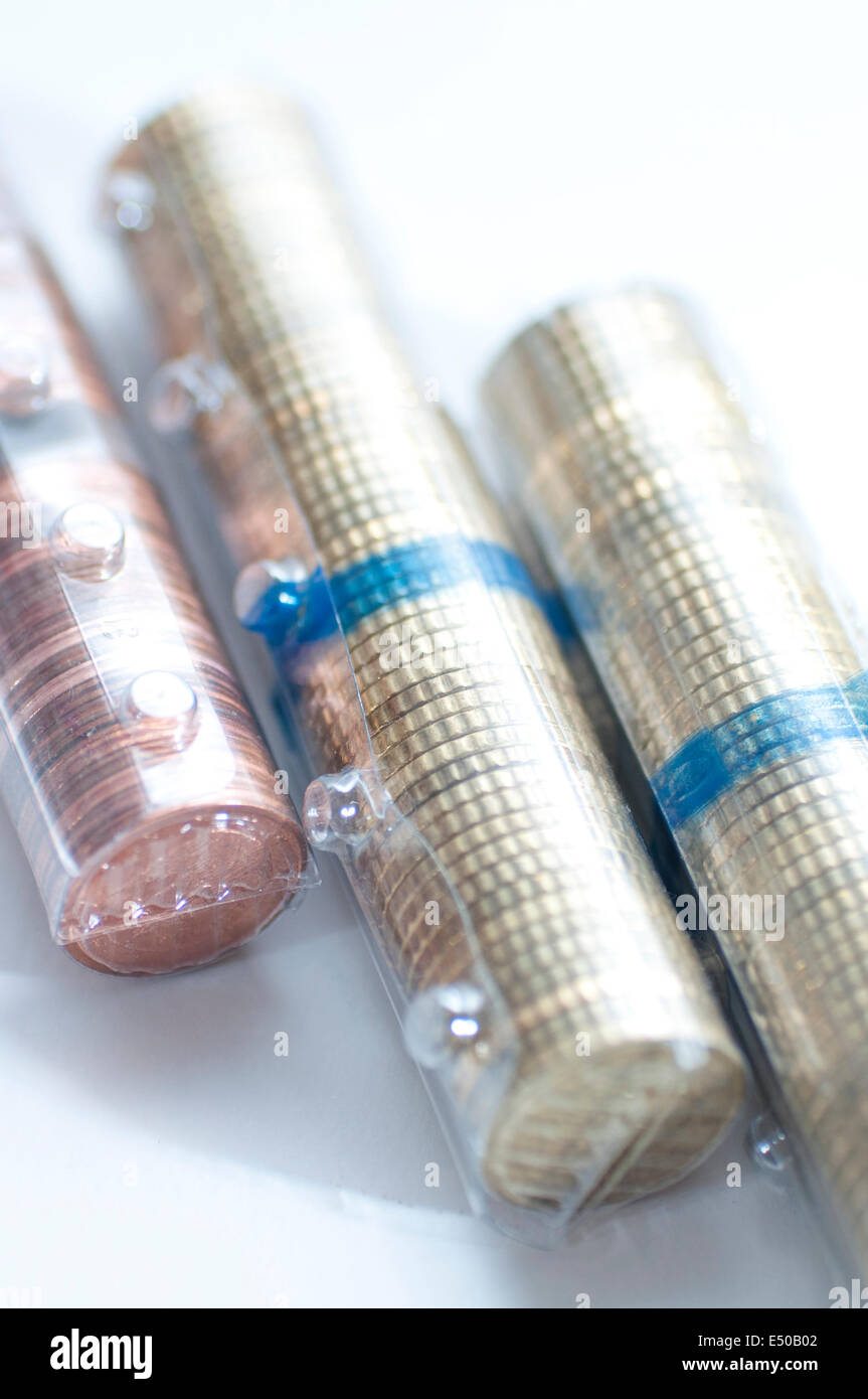 Roll of coins picture over white background. Euros Stock Photo - Alamy