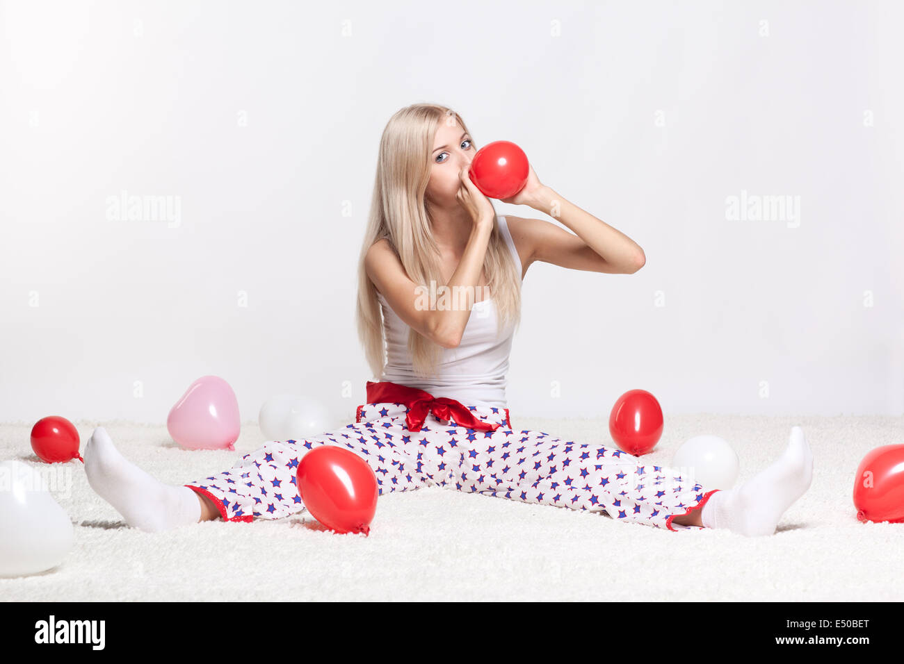 Inflating balloons hi-res stock photography and images - Alamy