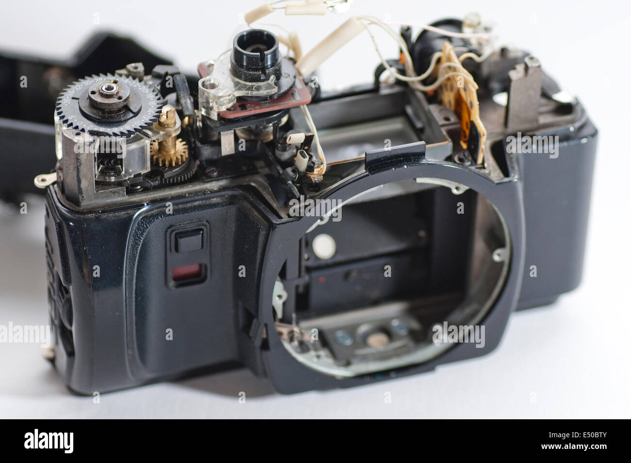 Broken camera picture over white background Stock Photo - Alamy