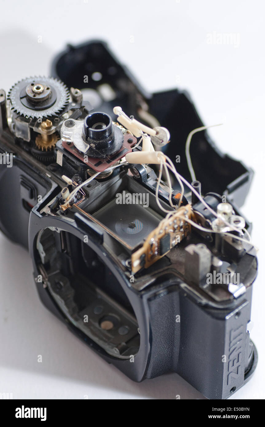 Broken camera picture over white background Stock Photo - Alamy