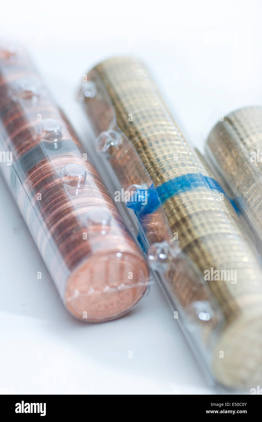 Roll of coins picture over white background. Euros Stock Photo - Alamy