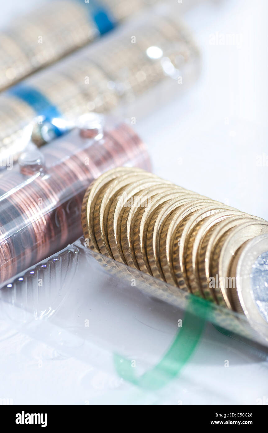 Roll of coins picture over white background. Euros Stock Photo - Alamy