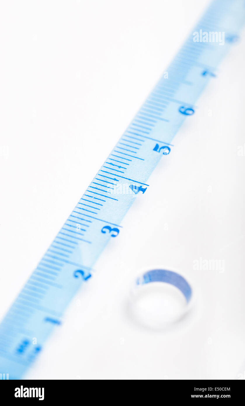 Ruler over white background with details and numbers Stock Photo - Alamy
