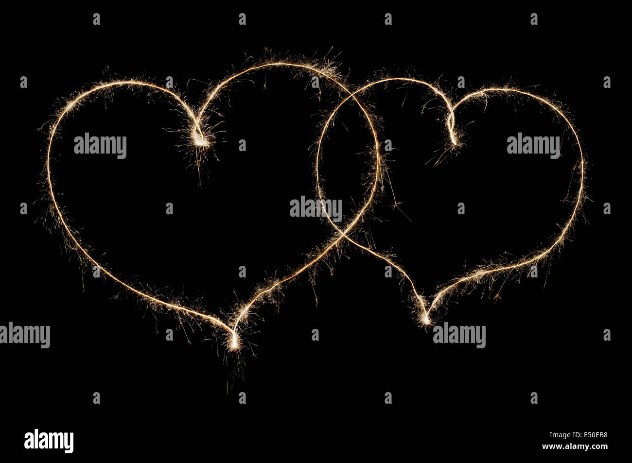 two hearts from sparkler Stock Photo - Alamy