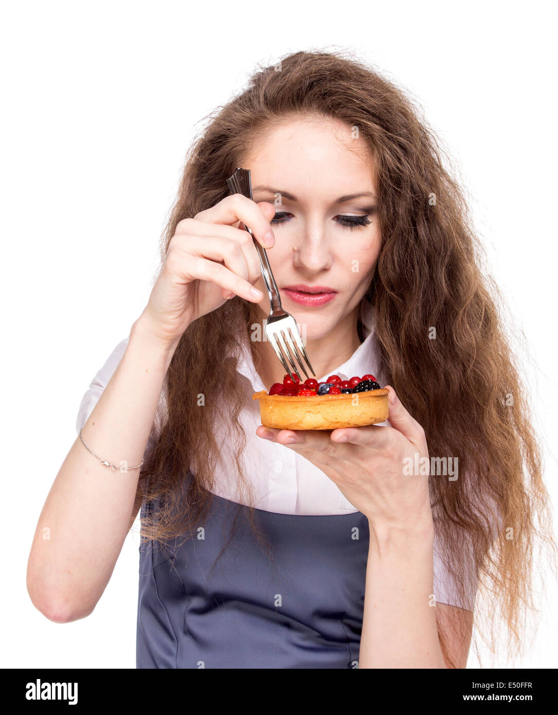 Woman enjoy cake Stock Photo - Alamy