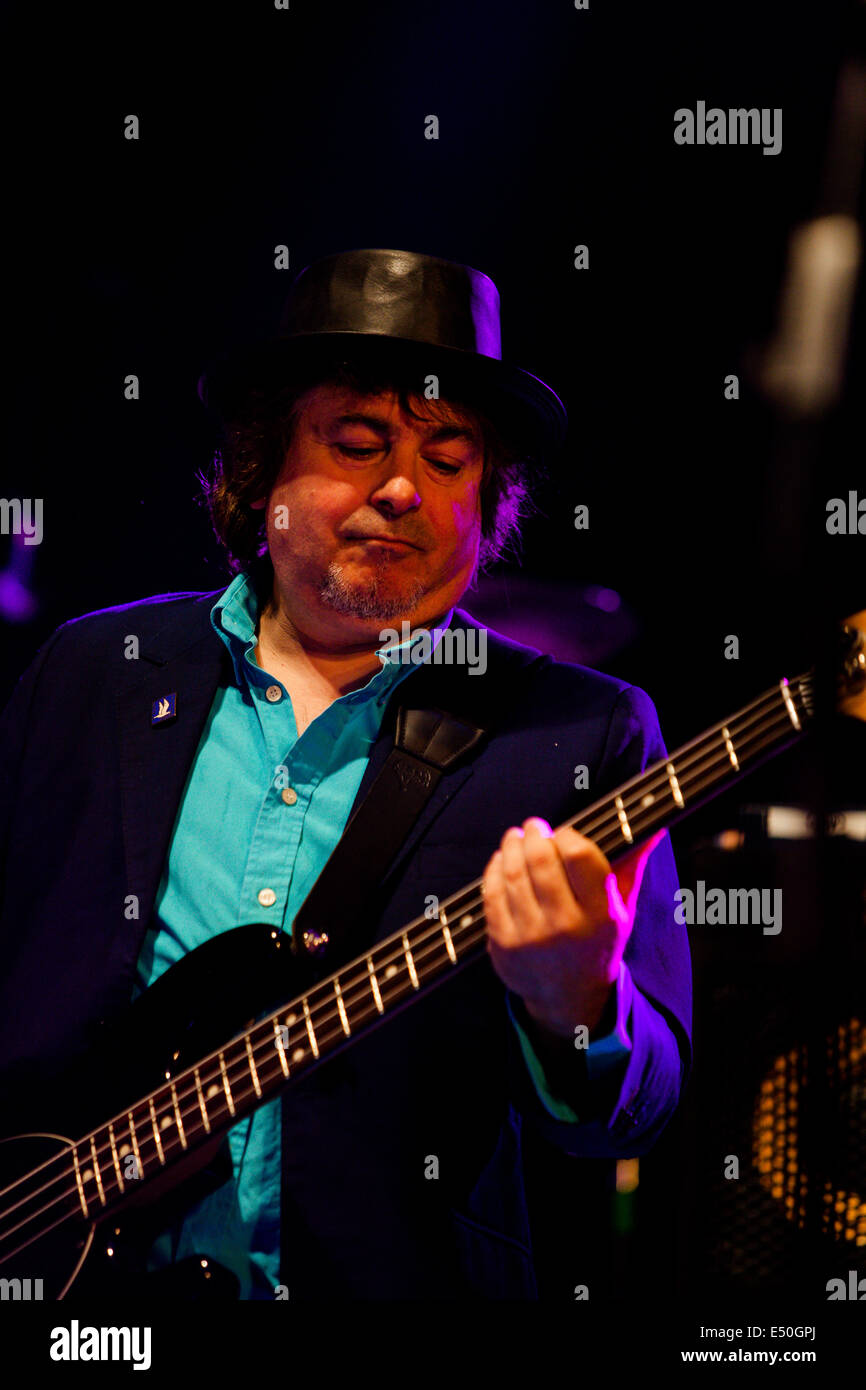 John Bentley performing live with rock band Squeeze at Larmer Tree ...
