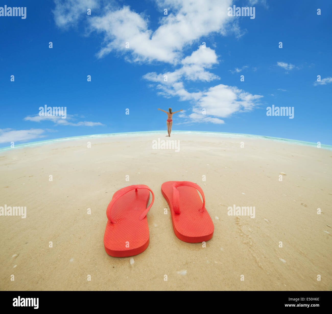 Red flip flops on the beach Stock Photo - Alamy