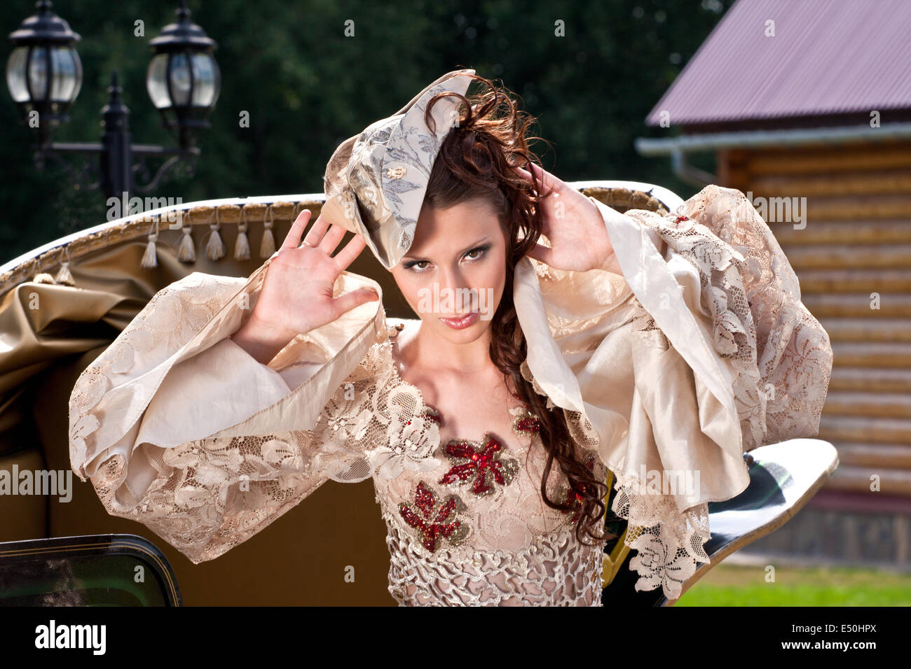 The woman in an old style dress Stock Photo - Alamy